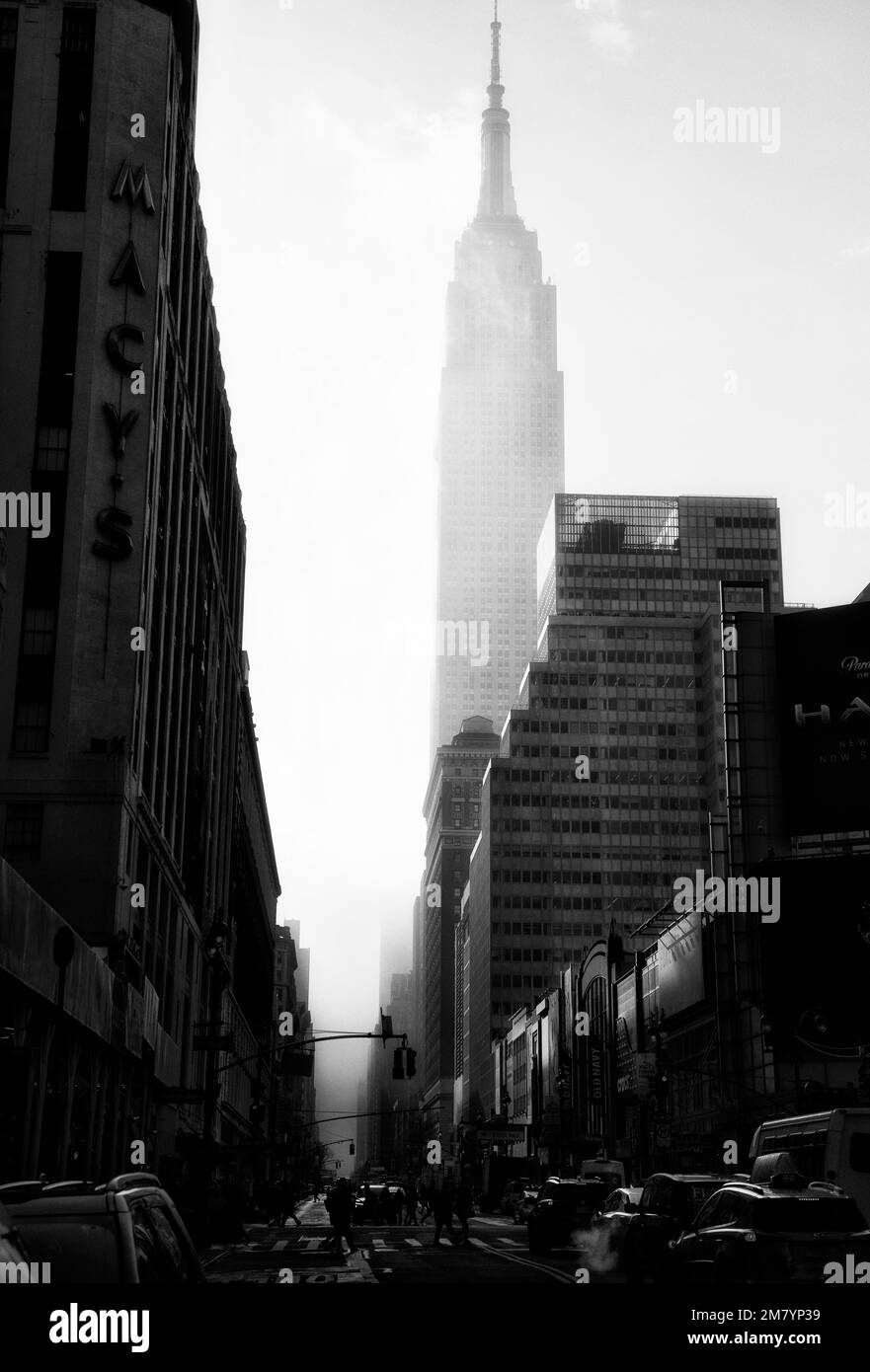 Atmospheric view of the Empire State Building on 34th Street, Midtown Manhattan New York USA ...