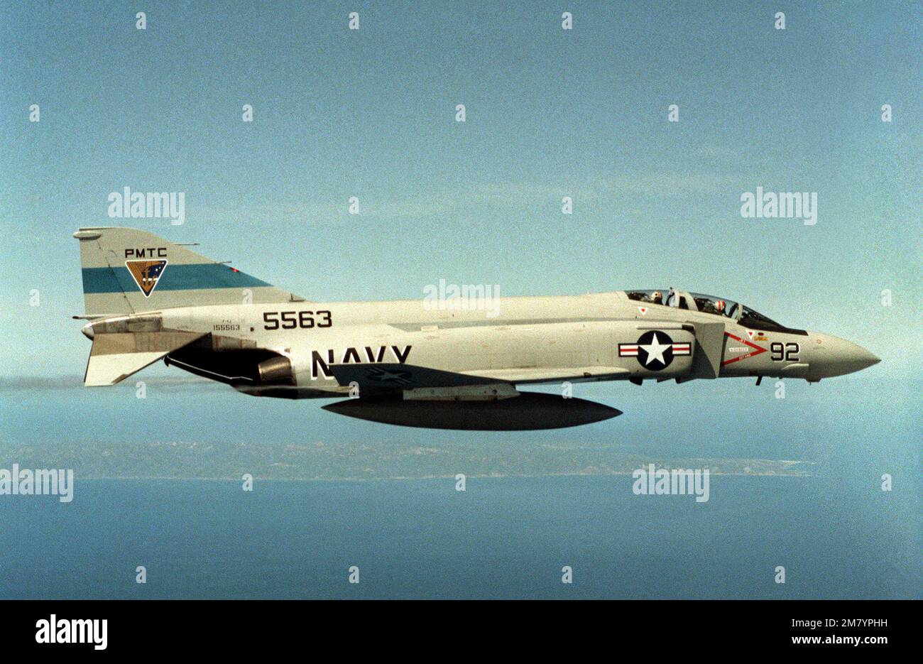 An air-to-air right side view of an F-4 Phantom II aircraft from ...