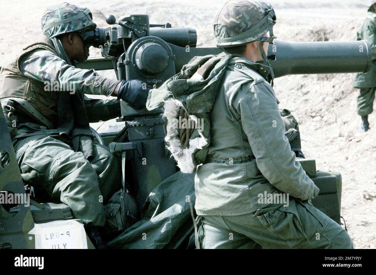 First Division Marines set up a tube-launched, optically-tracked, wired ...