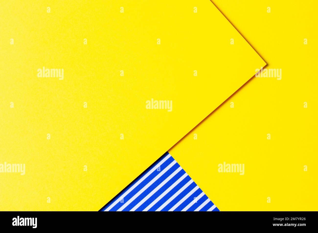 Abstract geometric bright colored papers texture background. Yellow ...