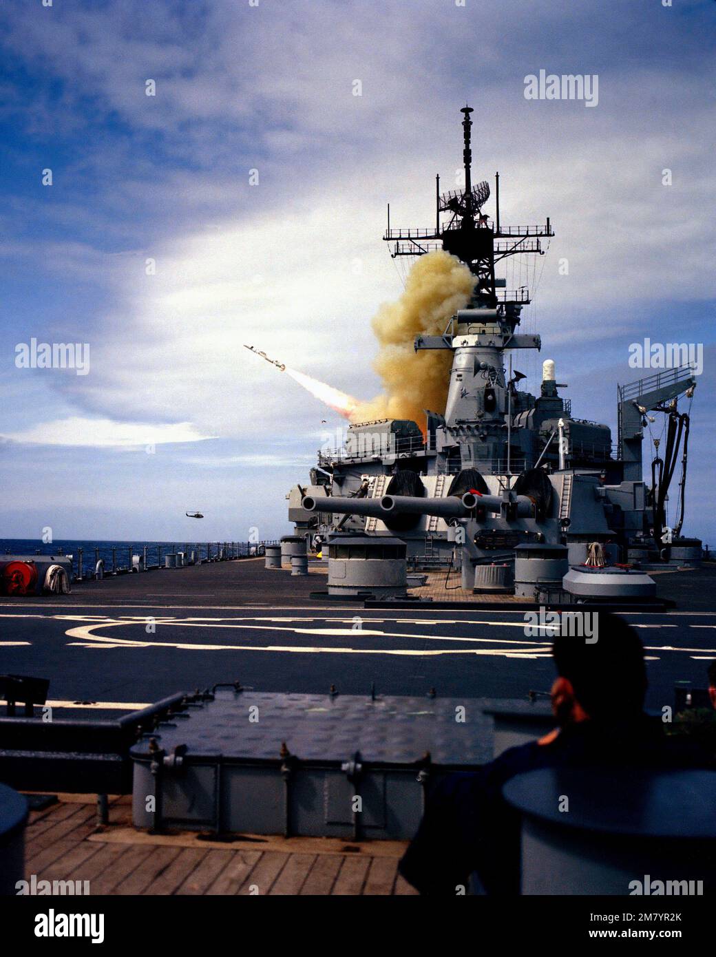 A Harpoon missile is launched from the battleship USS NEW JERSEY (BB 62 ...