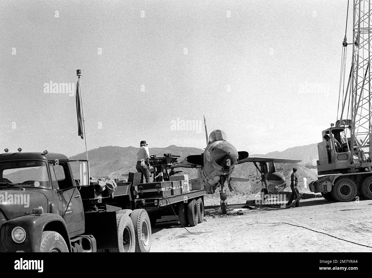 Members of the 402nd Combat Logistic Support Squadron prepare an F-105 ...