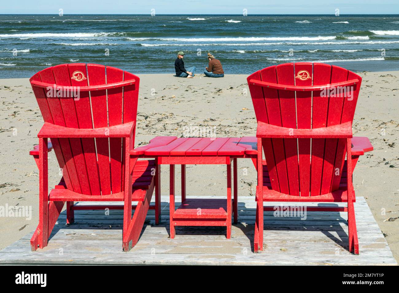 RED BEACH CHAIR ON THE BEACH OF SAINT LOUIS LAGOON, KOUCHIBOUGUAC ...