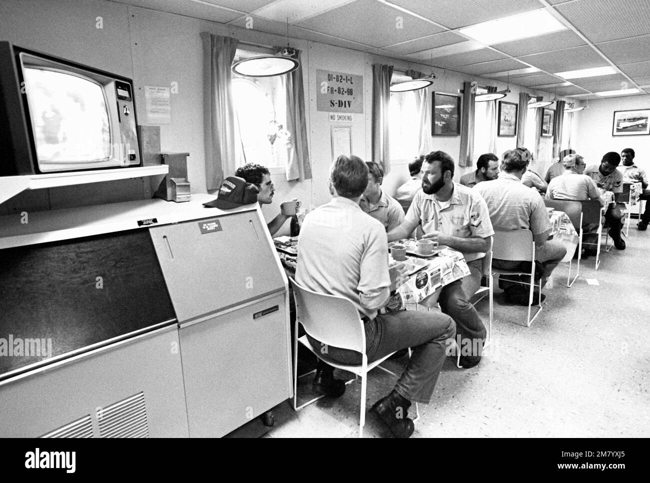 Crewman eat launch in the enlisted dining facility aboard the oiler USS ...