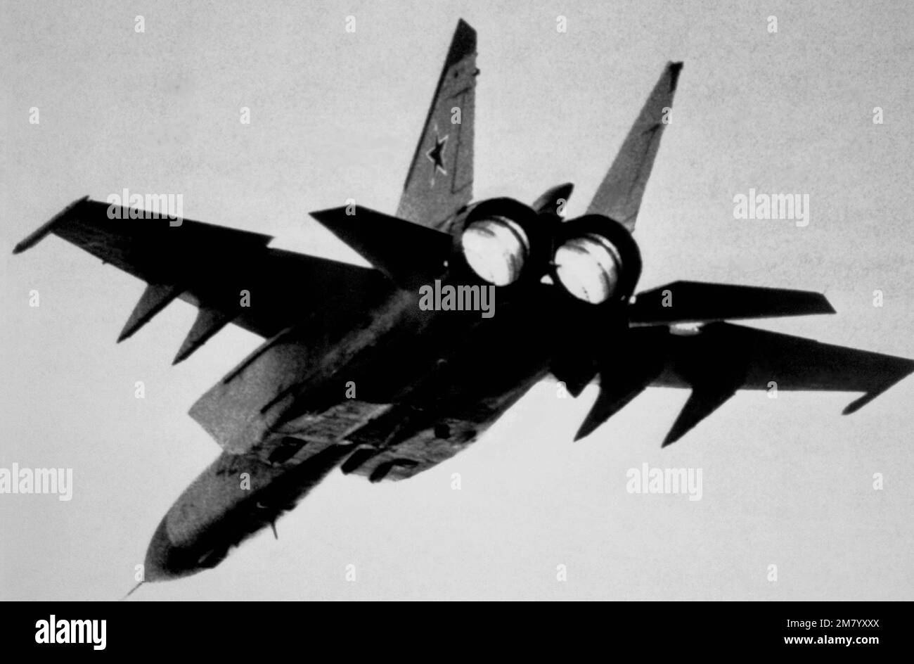 Bottom view of a Soviet MiG-25 Foxbat E interceptor aircraft in flight ...