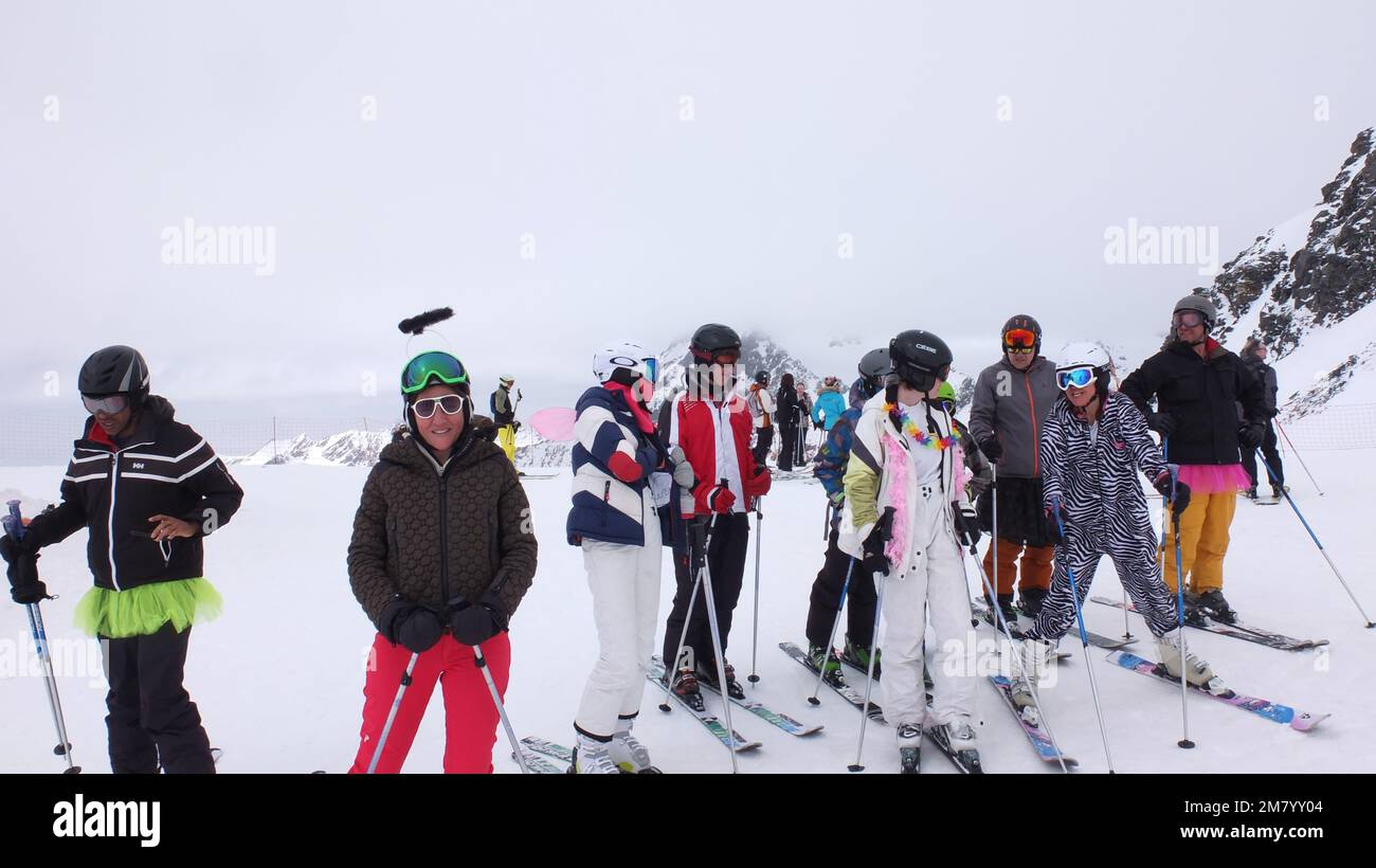 A group of skiers in Fancy Dress in the 3 Valleys above Orelle Stock ...