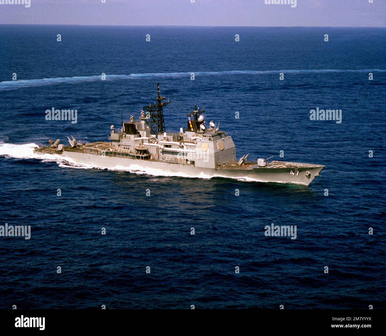 An aerial starboard bow view of the Aegis guided missile cruiser USS ...