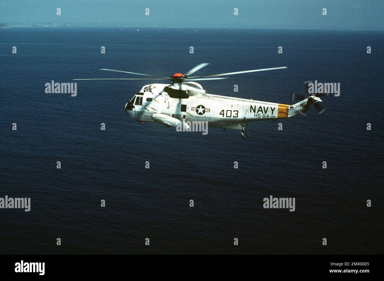 Air-to-air left side view of a Navy SH-3D Sea King helicopter assigned ...