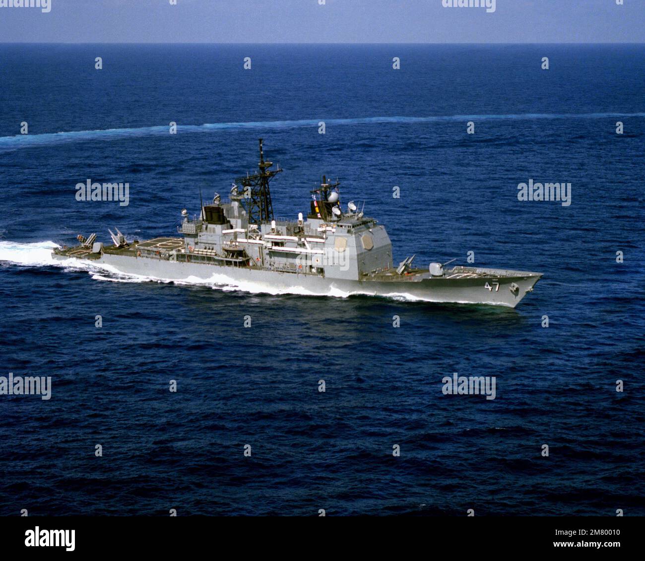 An aerial starboard bow view of the Aegis guided missile cruiser USS ...