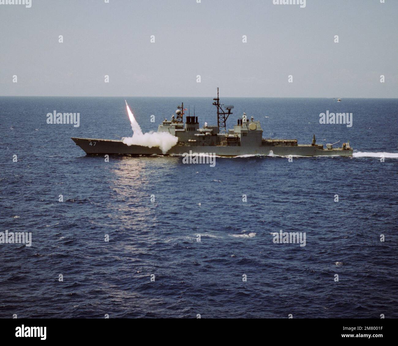 A Standard II missile is launched from the Aegis guided missile cruiser ...