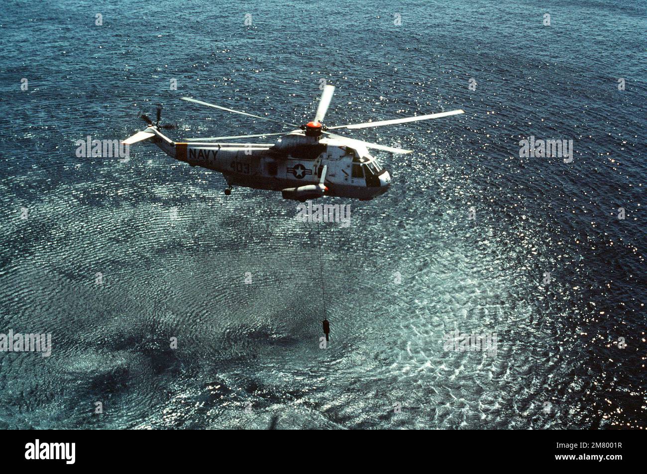 Air-to-air right side view of a Navy SH-3D Sea King helicopter assigned ...