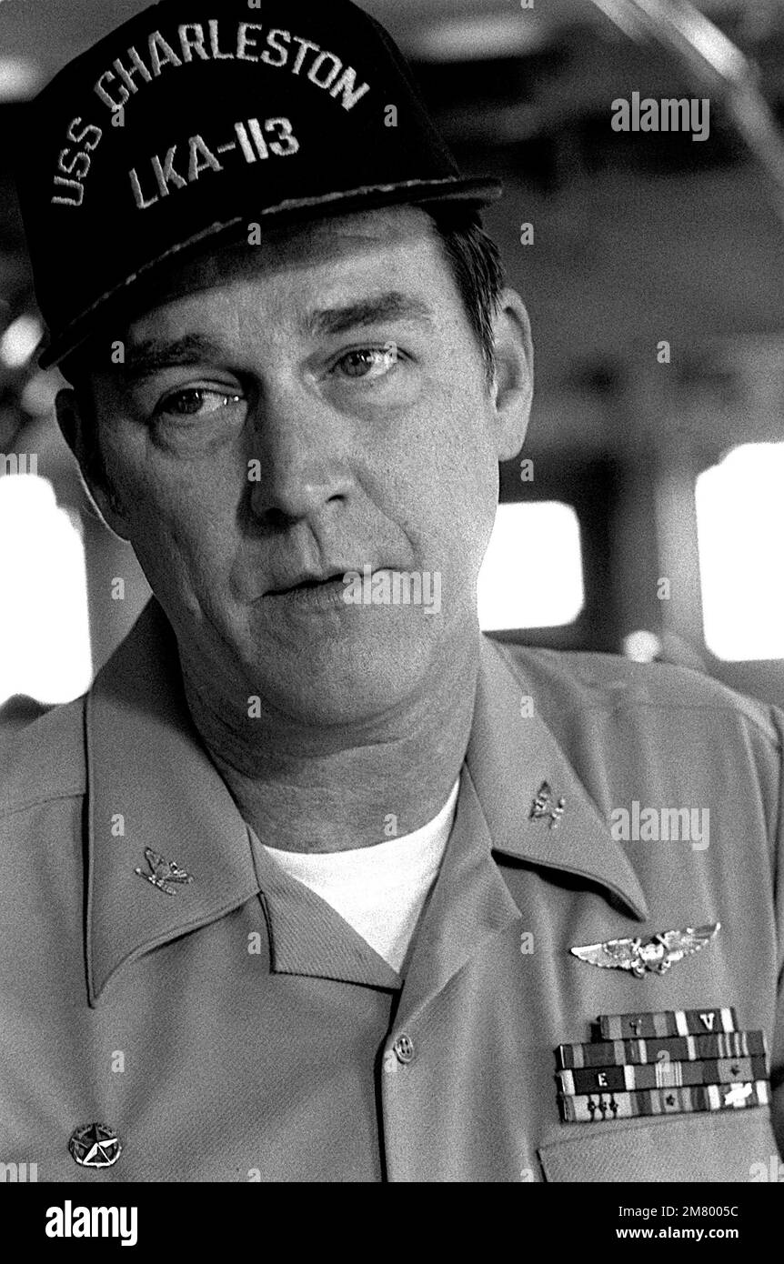 A view of CAPT Ward L. West, commanding officer of the amphibious cargo ...