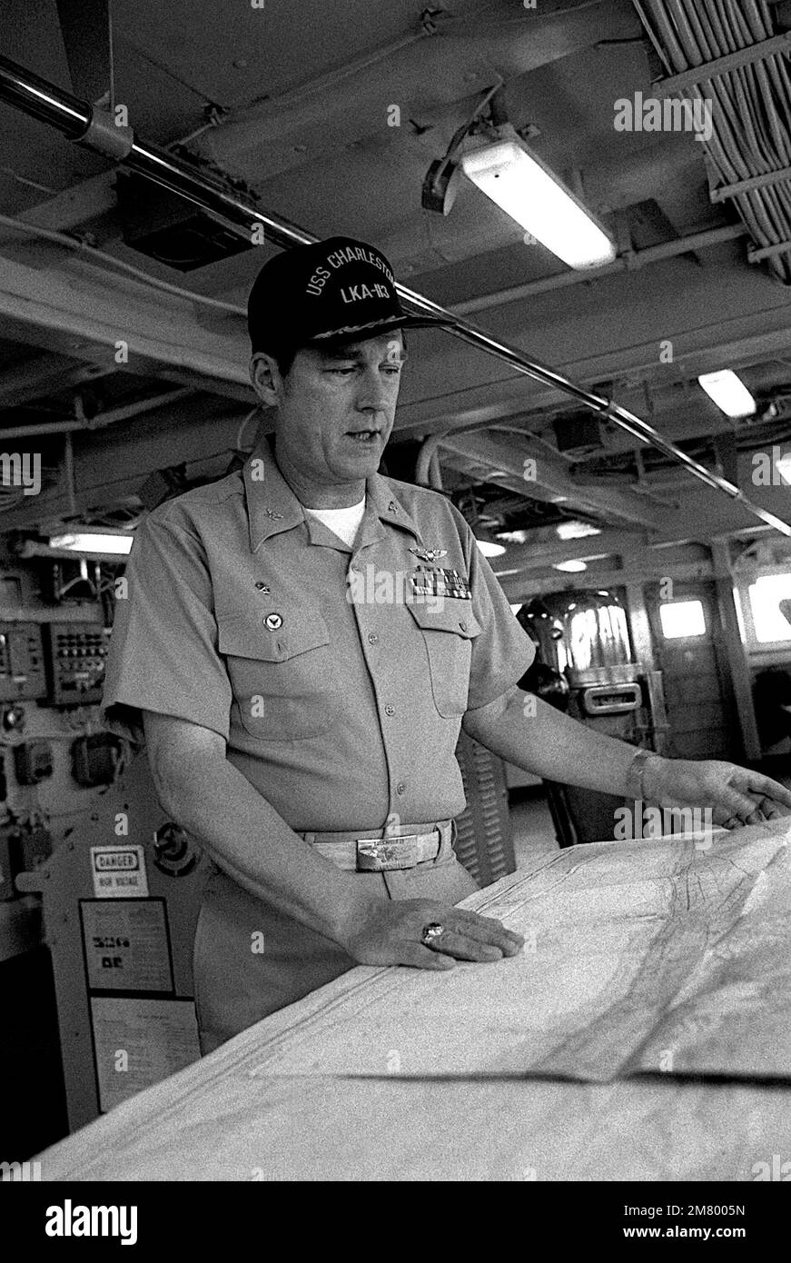 A view of CAPT Ward L. West, commanding officer of the amphibious cargo ...