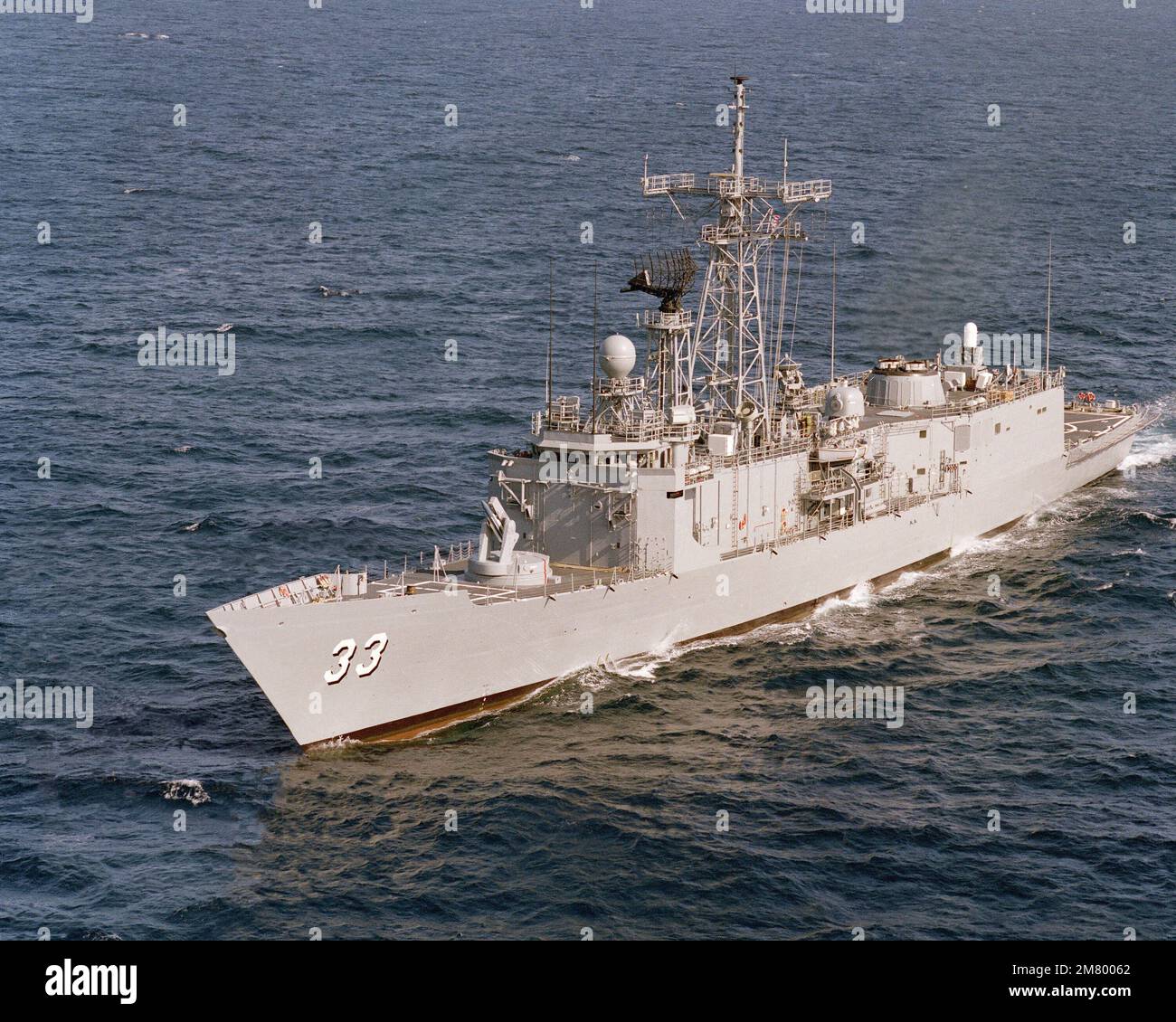 An aerial port bow view of the guided missile frigate USS JARRETT (FFG ...