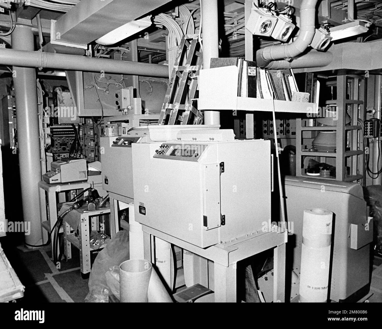 An interior view of the communications center on the guided missile ...