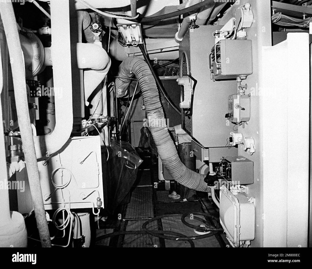 An interior view of auxiliary machinery room No. 3 on the guided ...