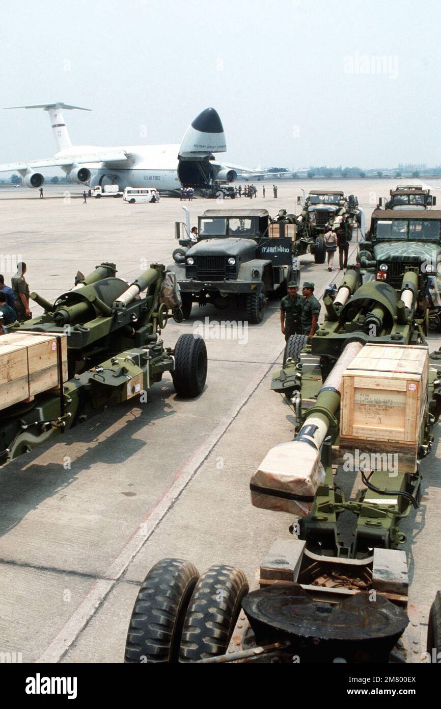 M-198 155mm howitzers are staged on the flight line at Dong Muong ...