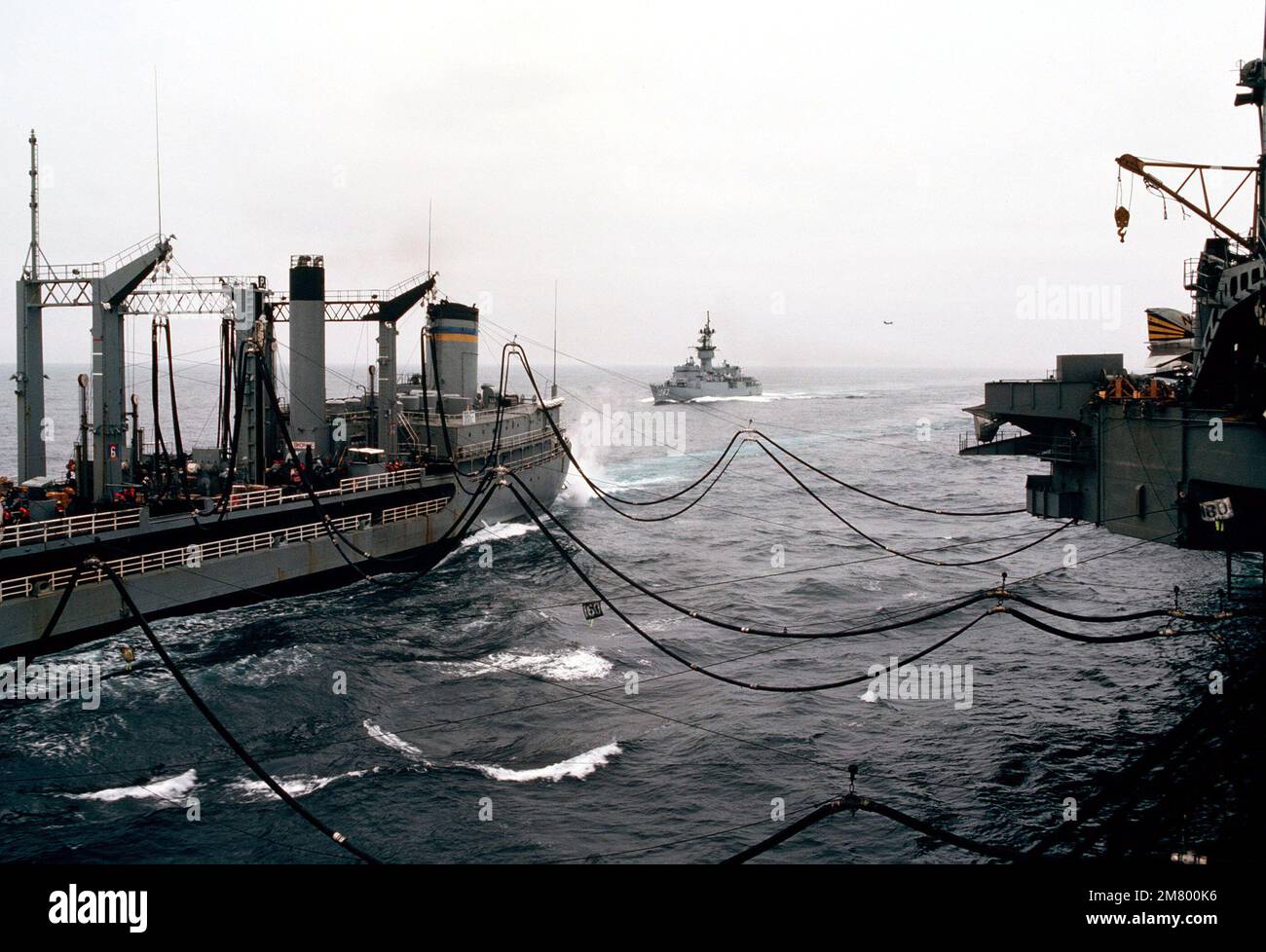 The oiler USNS MISPILLION (T-AO 105) conducts an underway replenishment ...
