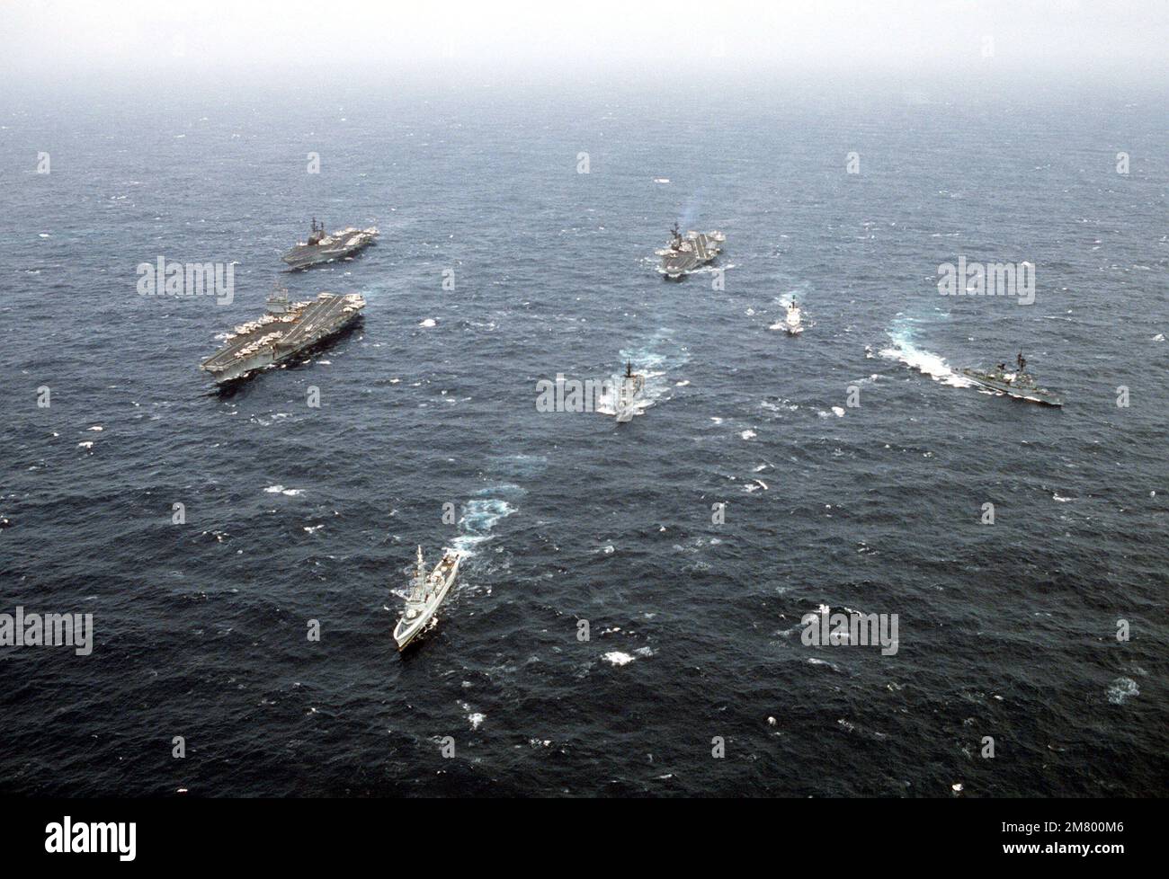 A port bow view of the nuclear-powered aircraft carrier USS ENTERPRISE ...