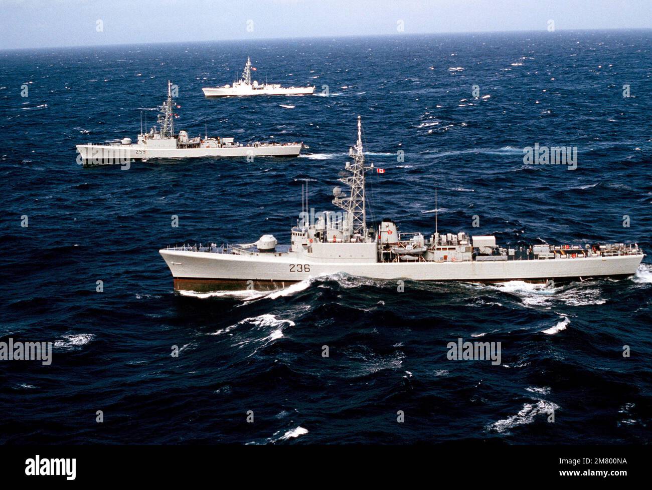 A port beam view of the Canadian frigates RESTIGOUCHE (257), rear, the ...