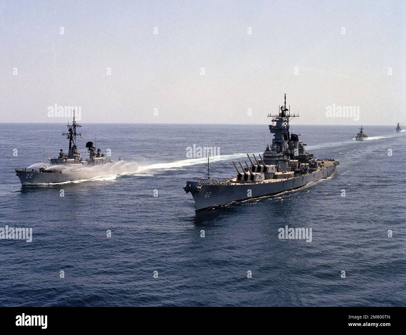 Aerial starboard bow view of the battleship USS NEW JERSEY (BB 62 ...