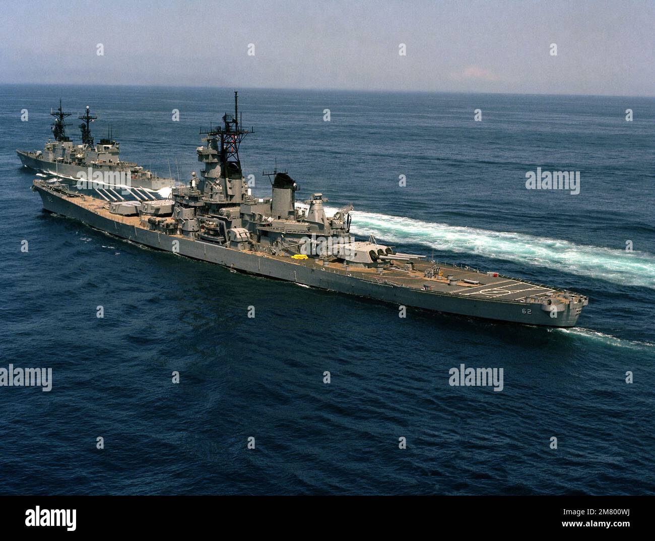 Aerial port quarter view of the battleship USS NEW JERSEY (BB 62 ...