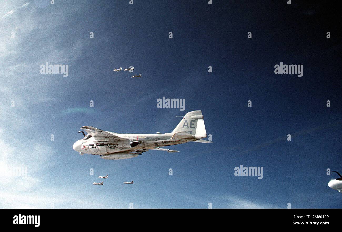 An air-to-air left underside view of an A-6E Intruder aircraft from ...