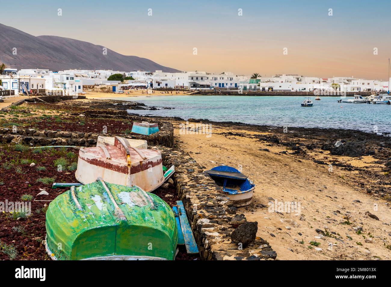 La Graciosa landscape - colorful boats on a shore and white ...