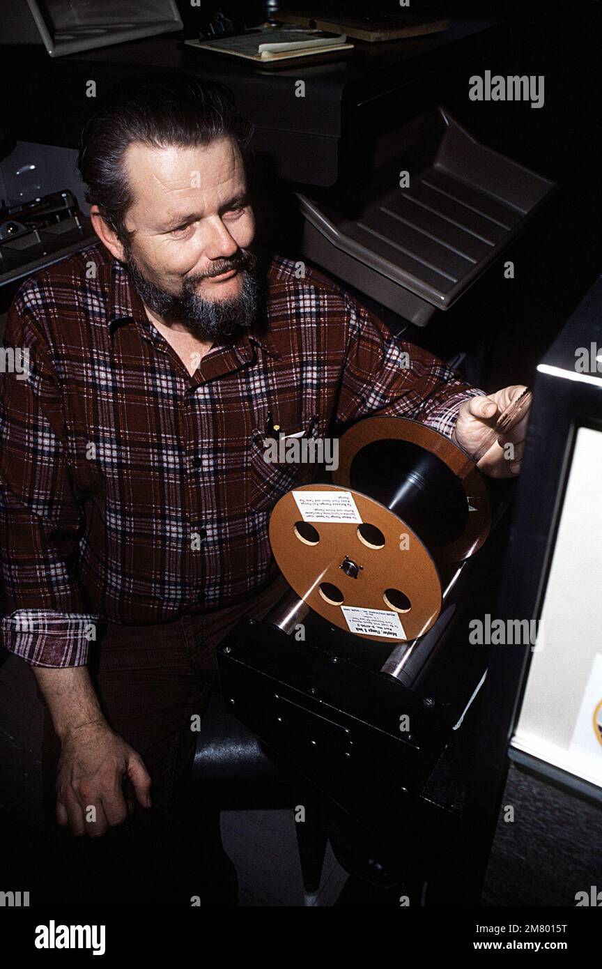 A photographer processes film in the photographic lab at the Pacific ...