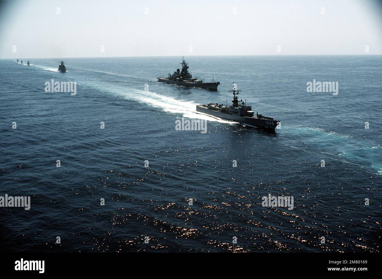 An aerial starboard bow view of the battleship USS NEW JERSEY (BB-62 ...