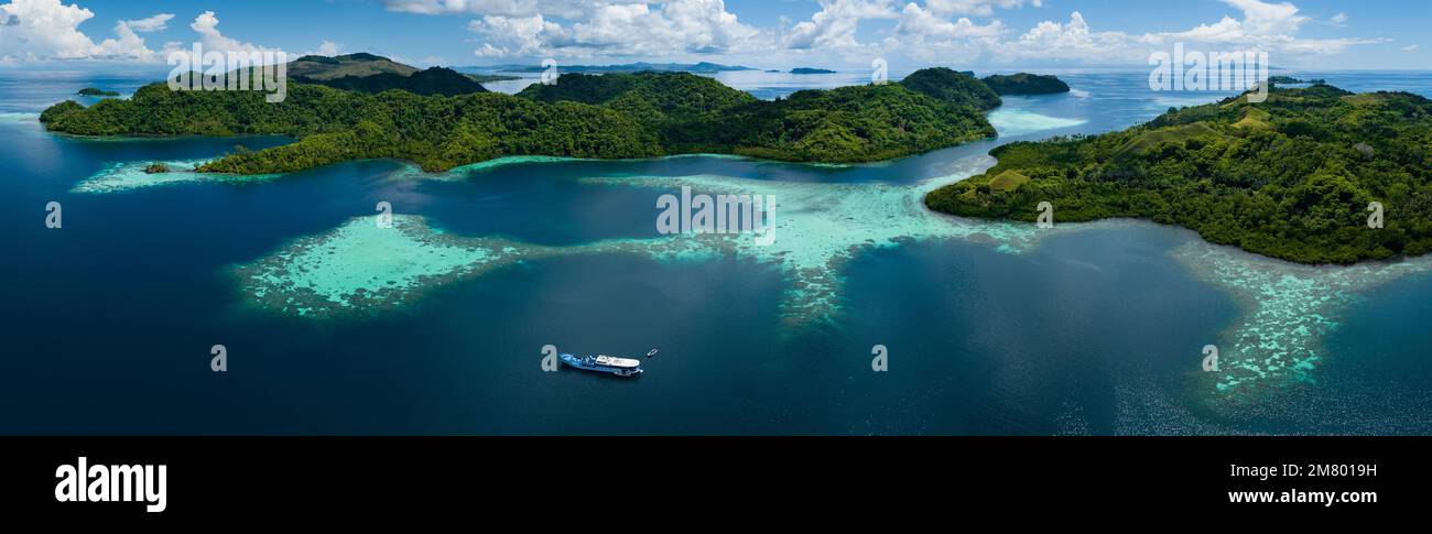 Extensive coral reefs fringe rainforest-covered islands in the Solomon ...