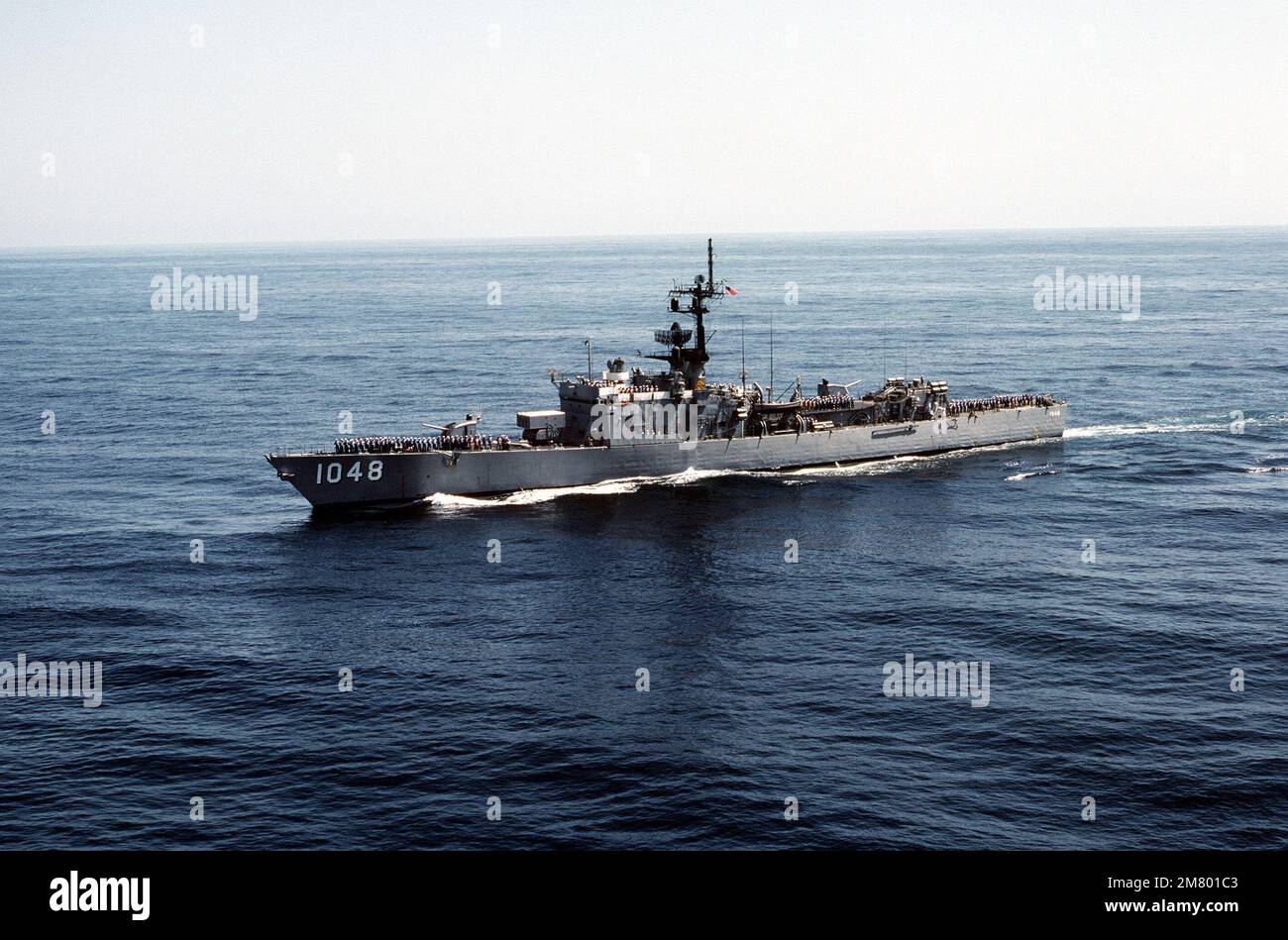 Aerial port bow view of the frigate USS SAMPLE (FF-1048) underway ...