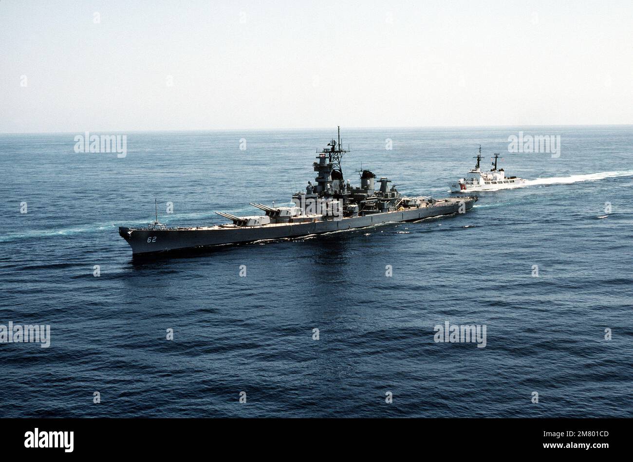Aerial port bow view of the battleship USS NEW JERSEY (BB-62), front ...