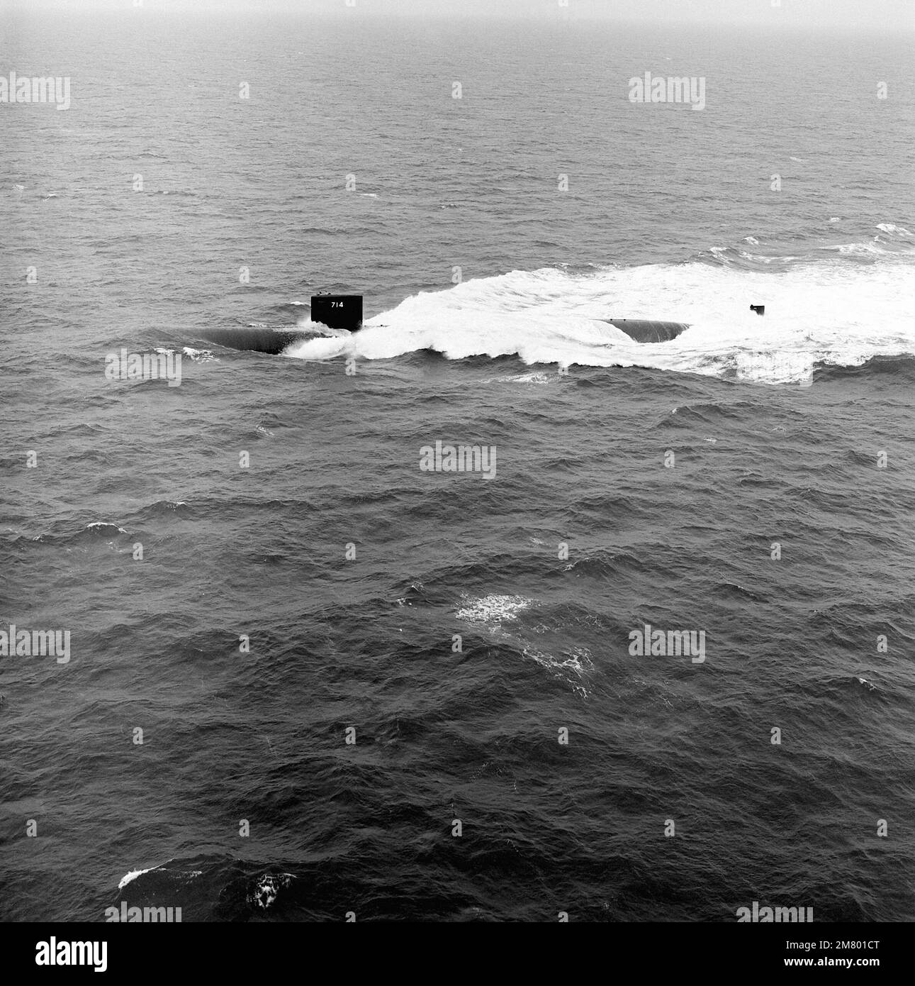 A port beam view of the nuclear-powered attack submarine USS NORFOLK ...
