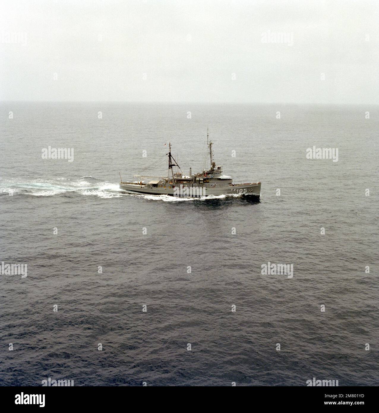 A starboard beam view of the fleet tug USS MOCTOBI (ATF 105) underway ...