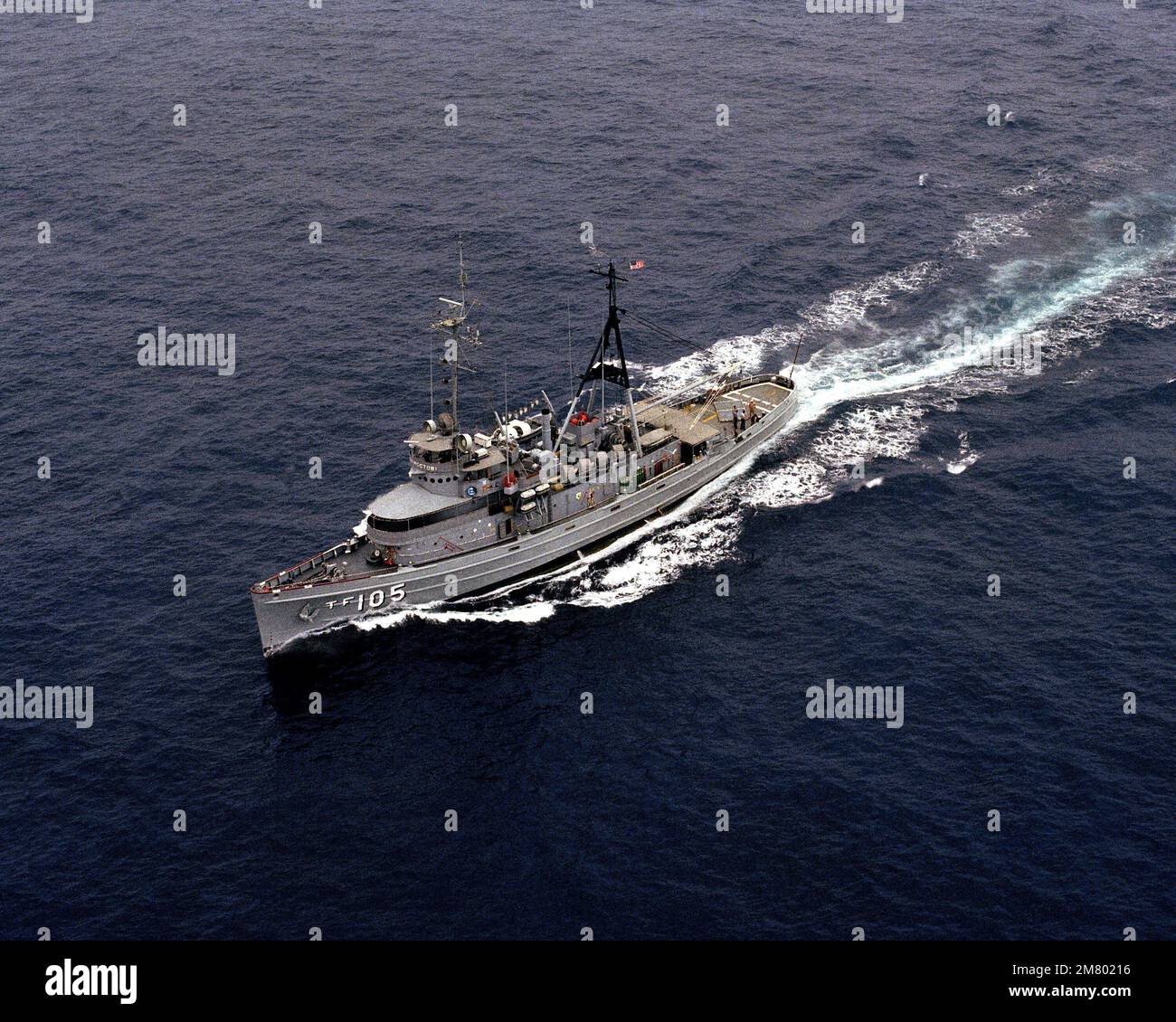 A port bow view of the fleet tug USS MOCTOBI (ATF 105) underway ...