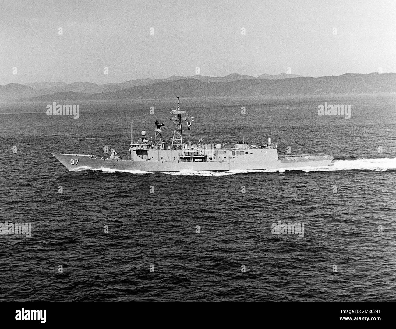 A port beam view of the guided missile frigate USS CROMMELIN (FFG 37 ...