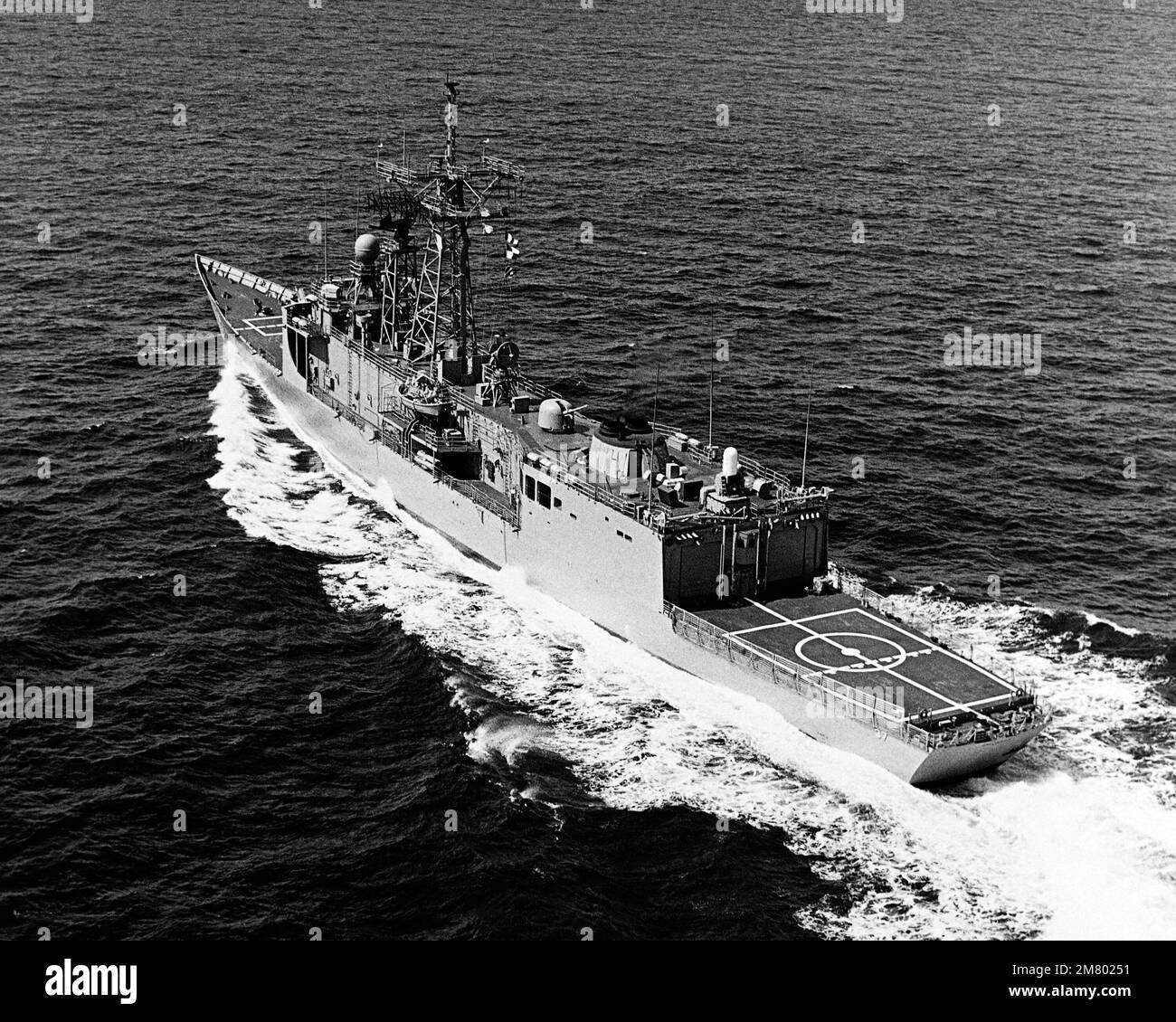 A port quarter view of the guided missile frigate USS CROMMELIN (FFG 37 ...