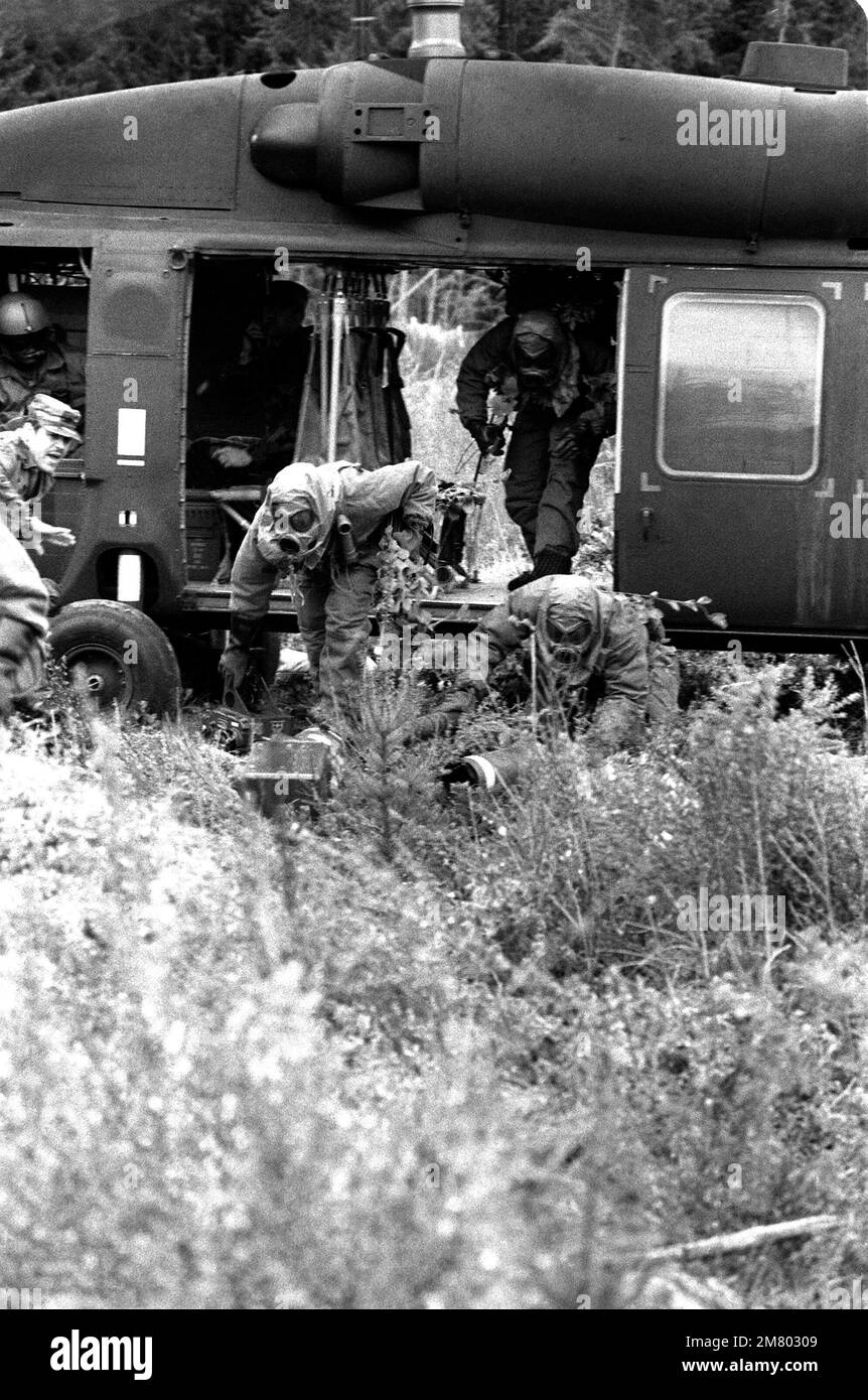 Students of the Basic Non-Commissioned Officers Course exit a UH-60 ...