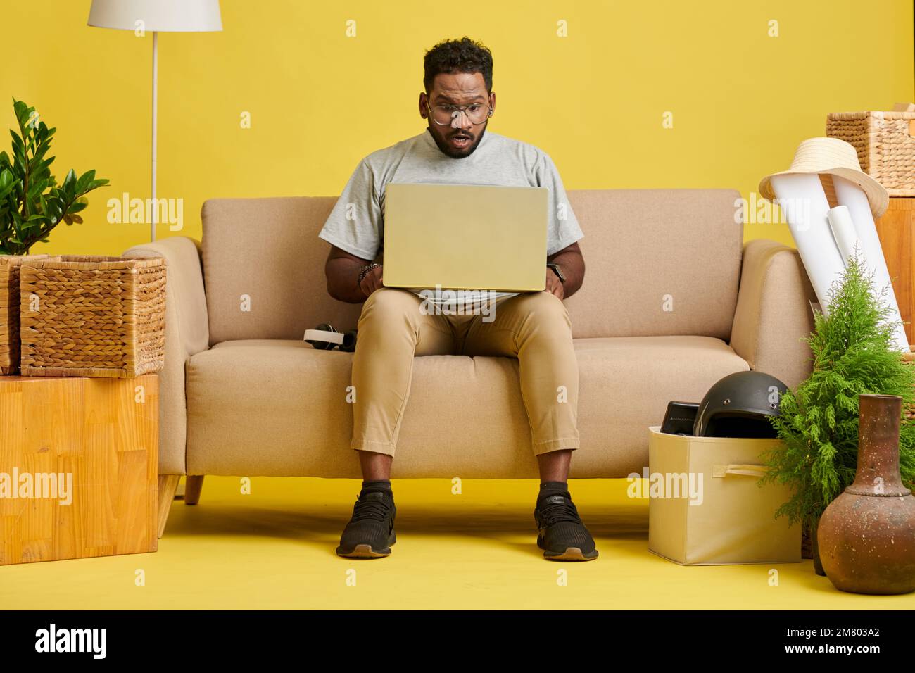 Shocked man reading e-mail with exciting news on laptop Stock Photo - Alamy