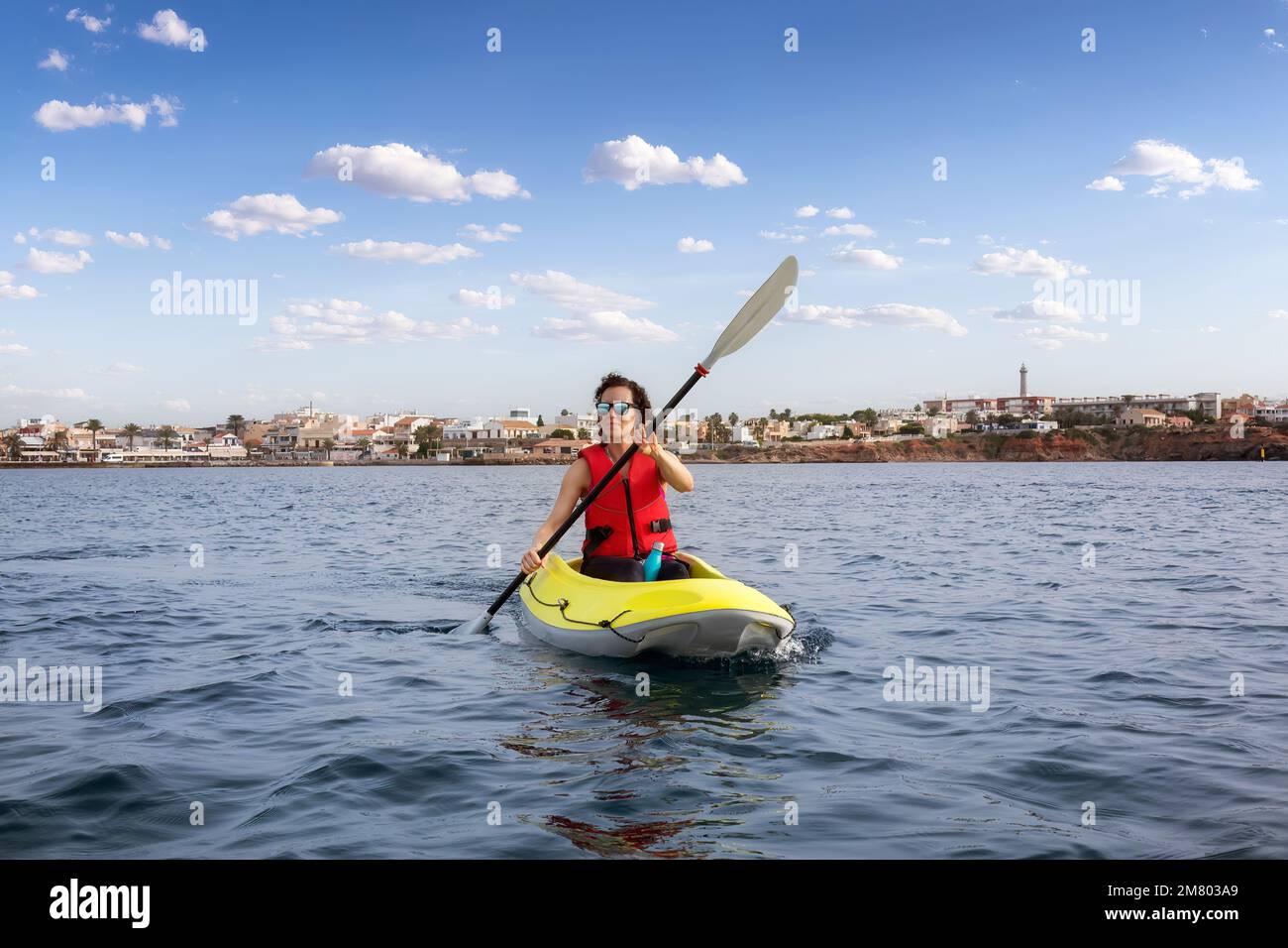 Adventurous Woman on a Kayak paddling in the Mediterranean Sea. Cape ...