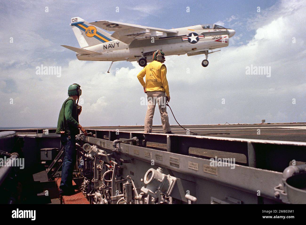 Coming in for an arrested landing, an Attack Squadron 66 (VA-66) A-7E ...