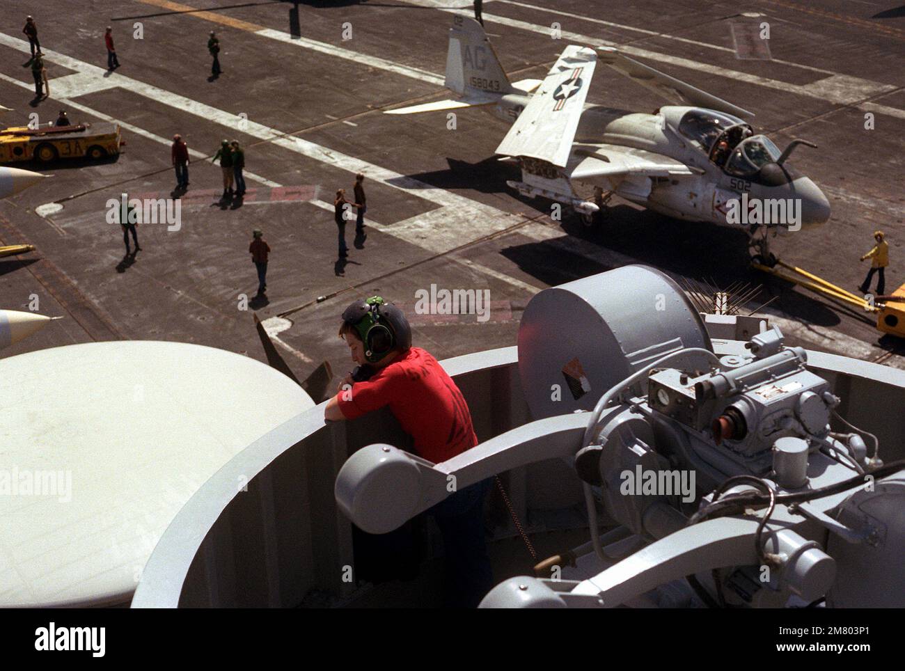 As seen from the ship's O-9 level, an Attack Squadron 65 (VA-65) A-6E ...