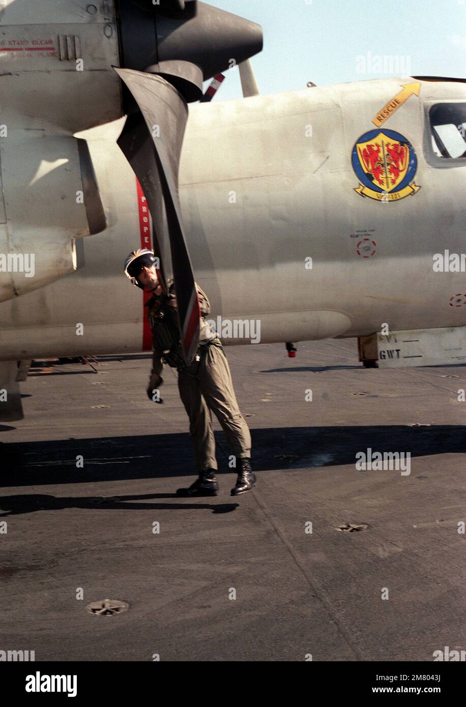 A member of the crew of an Airborne Early Warning Squadron 121 (VAW-121 ...