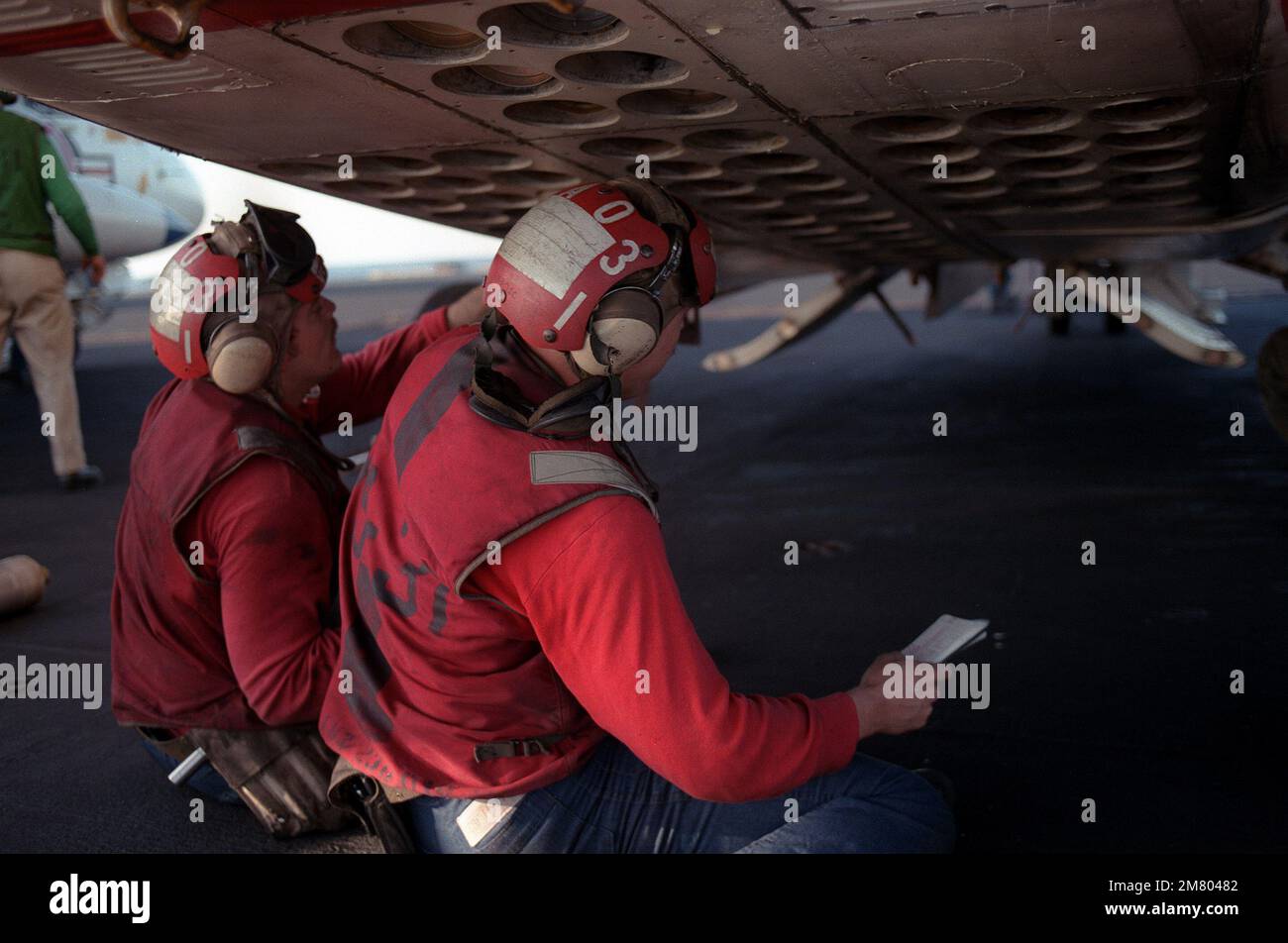 Ordnancemen from Air Anti-submarine Squadron 31 (VS-31) make a ...
