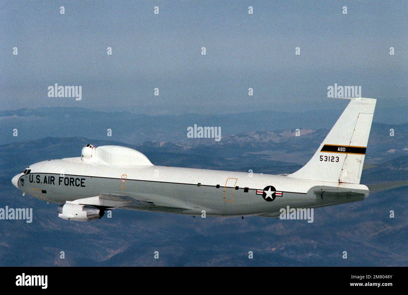 An air-to-air left rear view of a US Air Force NKC-135A Stratotanker ...