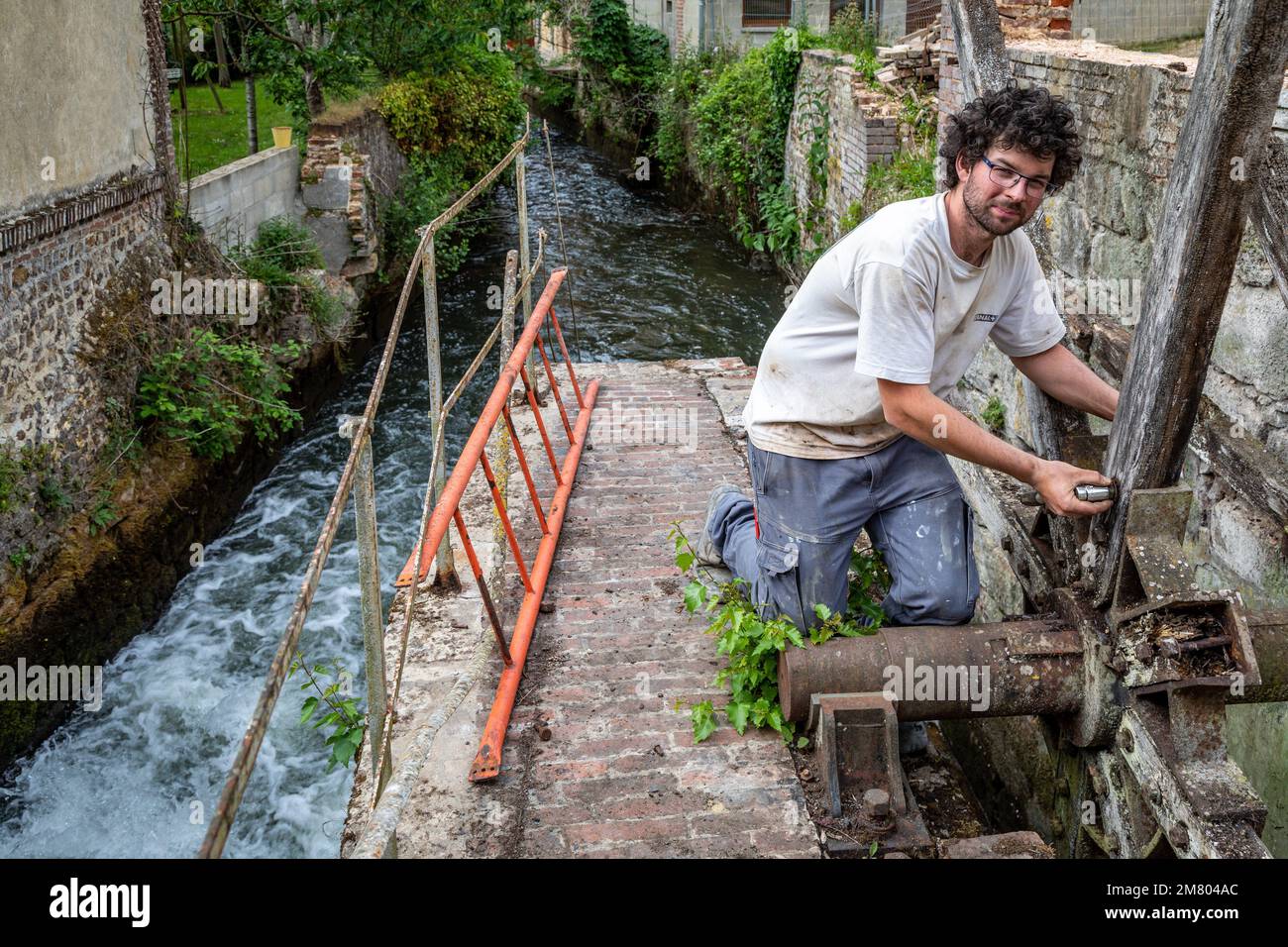 MAINTENANCE OF A WATERWHEEL, VALLEY OF THE RISLE, EURE, NORMANDY ...