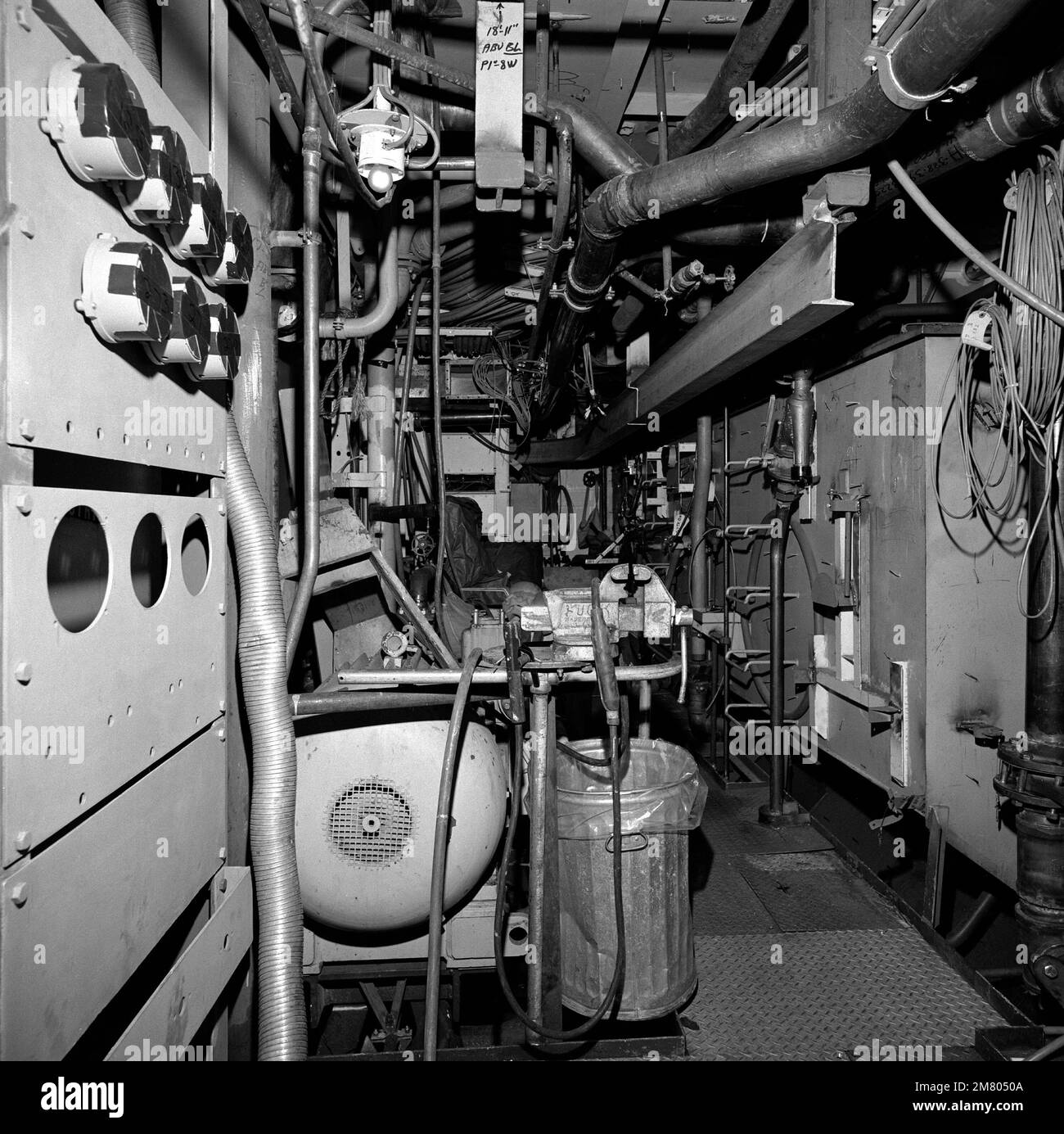 The lower level engine room aboard the guided missile frigate NICHOLAS ...