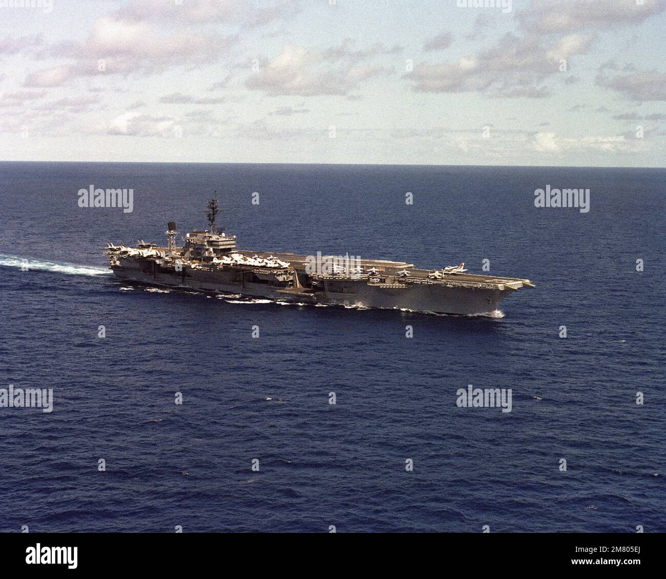 An aerial starboard bow view of the aircraft carrier USS KITTY HAWK (CV ...