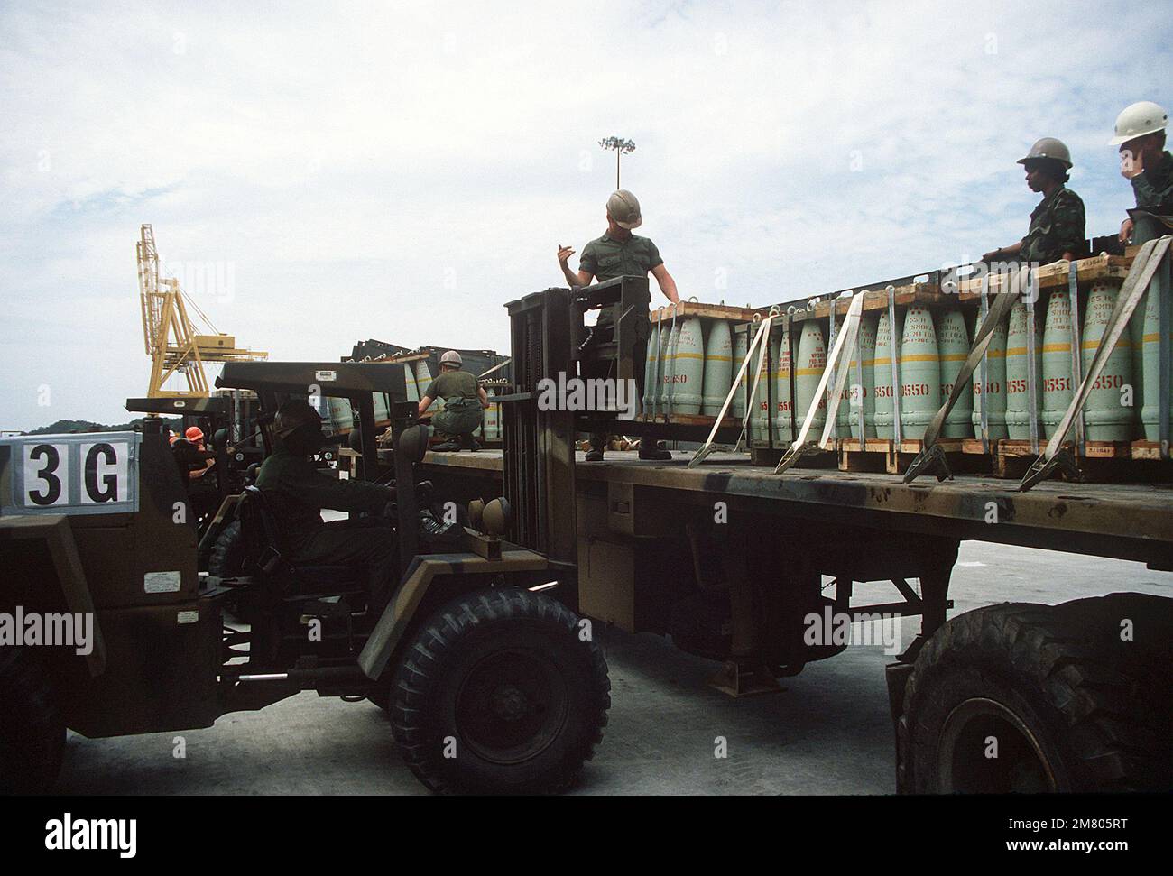 Members of the 155th Transportation Company use a Case M4K rough ...
